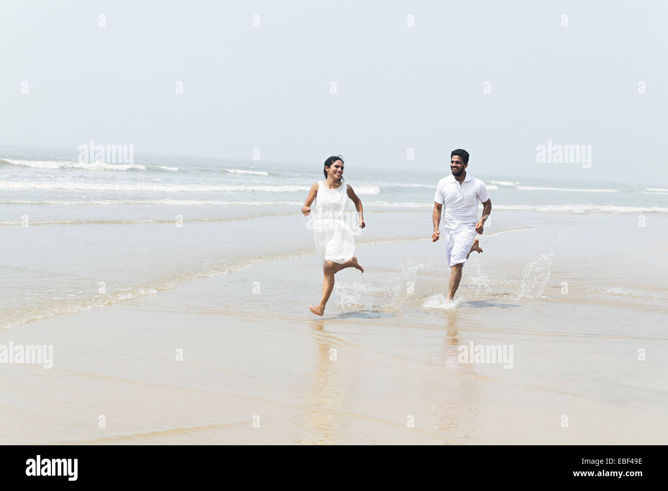 Couple standing side by side hi-res stock photography and images - Alamy