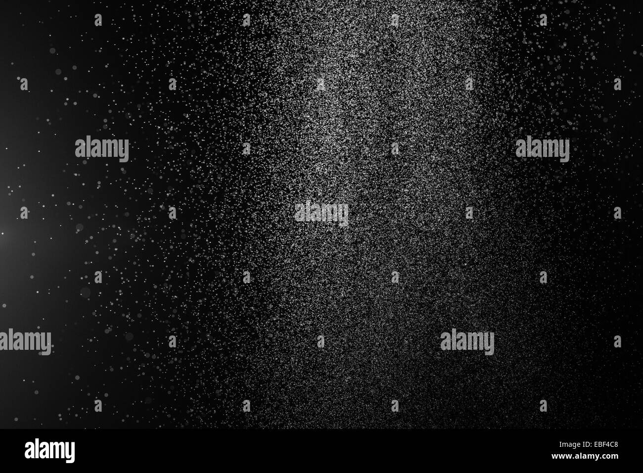 Splashes drops on surface Black and White Stock Photos & Images - Alamy