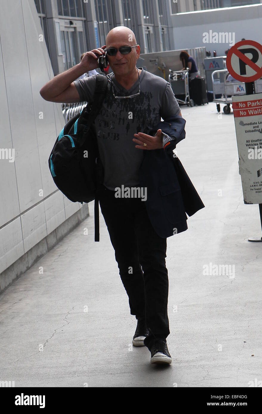 Howie Mandel chats on his mobile phone at Los Angeles International ...