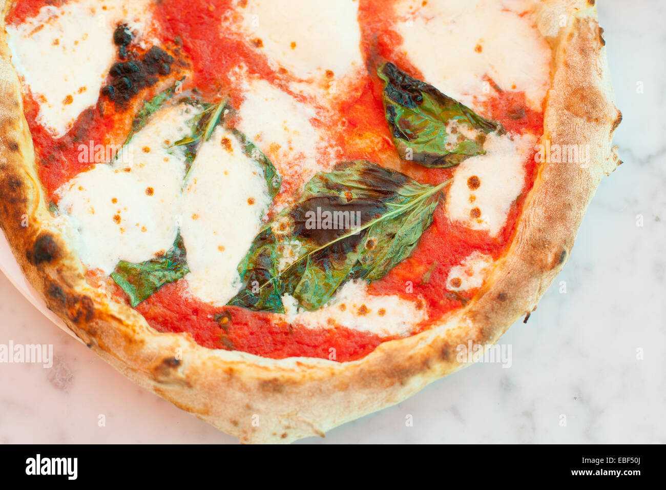 Overhead of oven wood-fired margherita pizza Stock Photo - Alamy