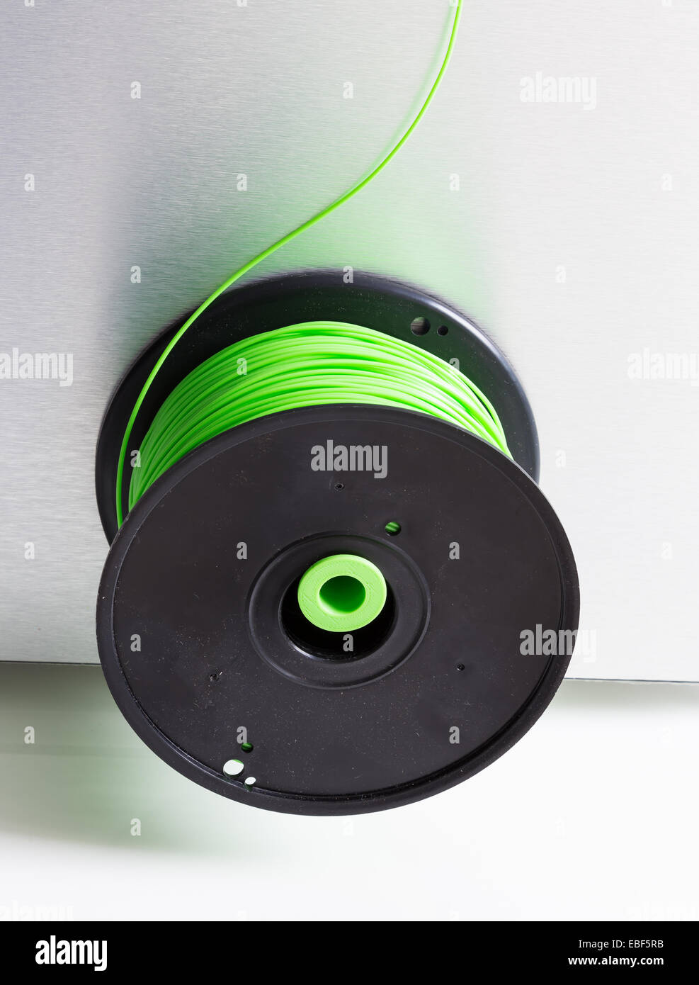 3d printer with bright green filament Stock Photo - Alamy