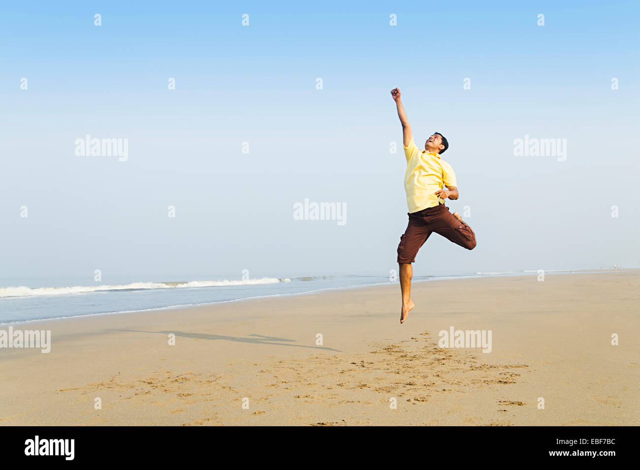 indian man Sea Side Jumping Stock Photo - Alamy
