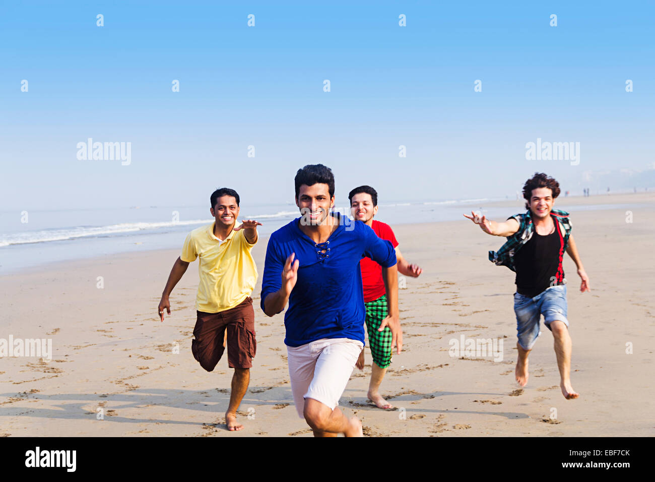 indian friends beach Running Stock Photo - Alamy