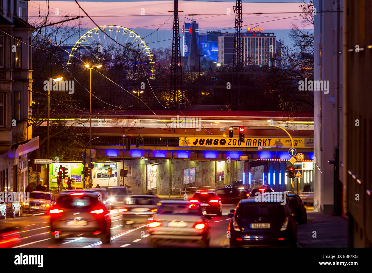 A nightly traffic in downtown Essen, Steeler Street, railway underpass ...