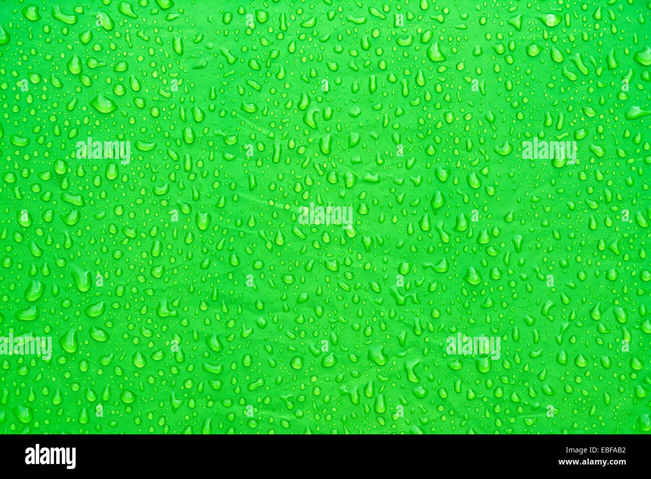 Tent fabric green with water drops Stock Photo - Alamy