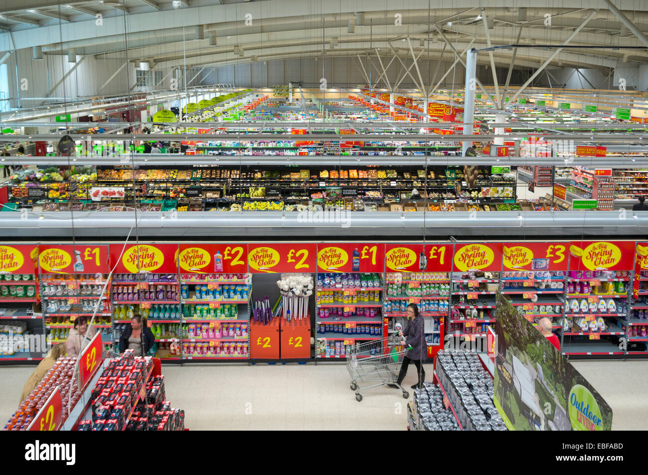 High angle from above view of aisles and customers at an Asda ...
