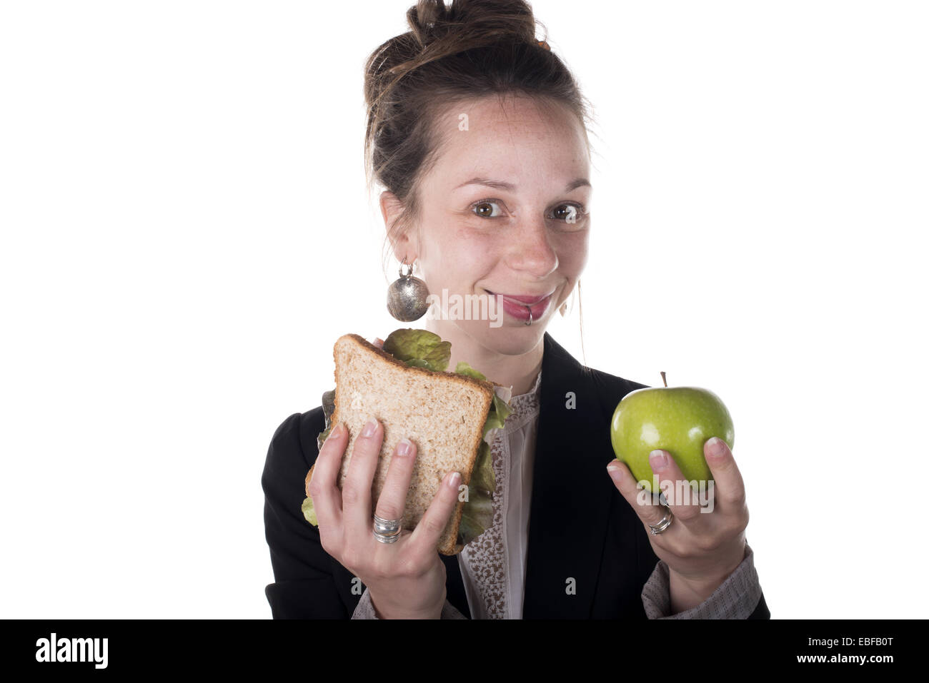 Young Woman in Dessert Choice between Junk Cake Food or healthy Apple ...