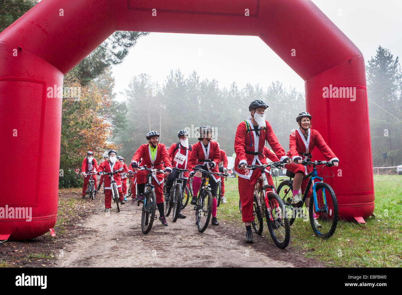 Fund-raisers dressed as Santas cycled in the 'Santa Cycle', part of the ...