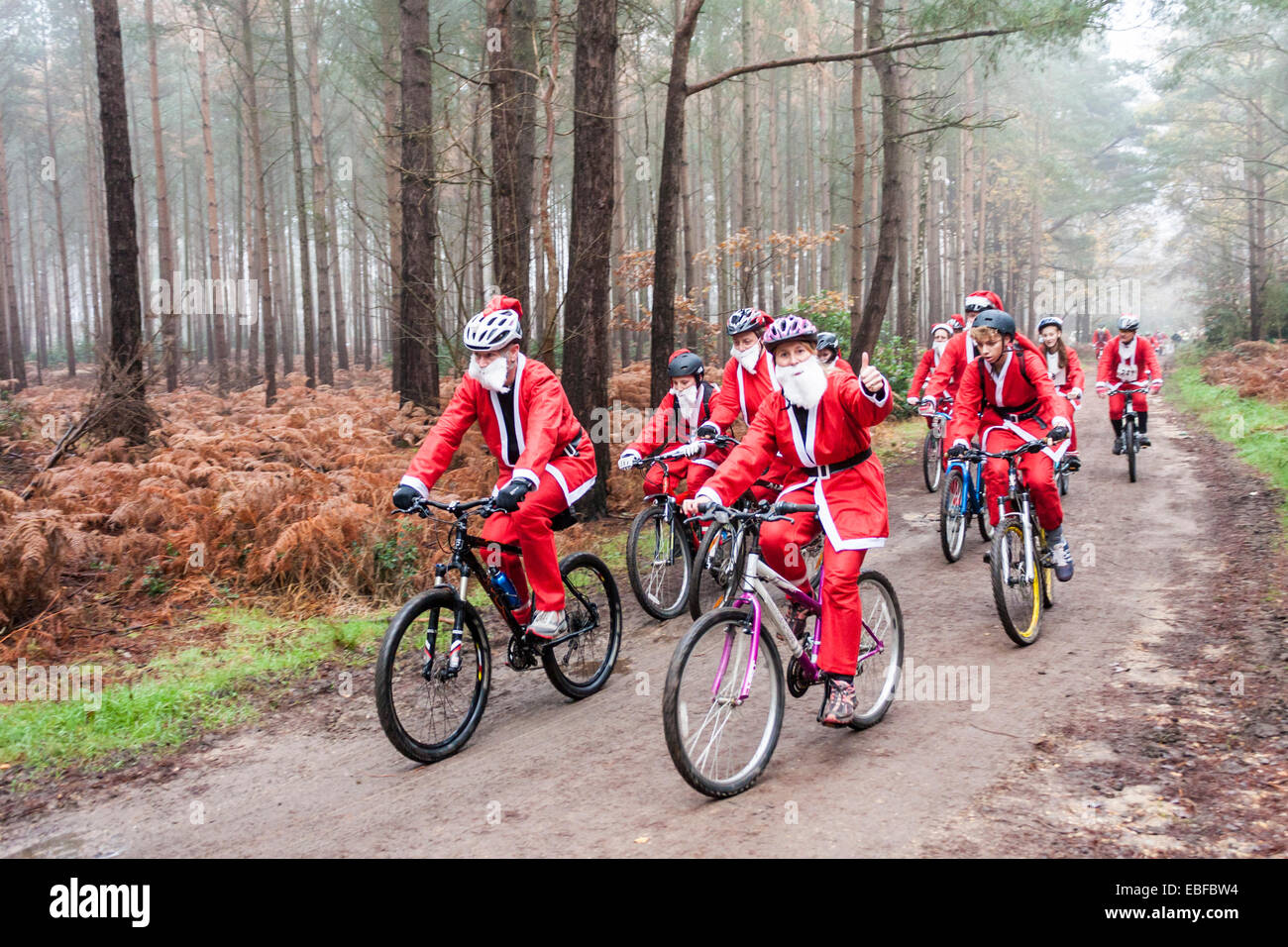 Fund-raisers dressed as Santas cycled in the 'Santa Cycle', part of the ...