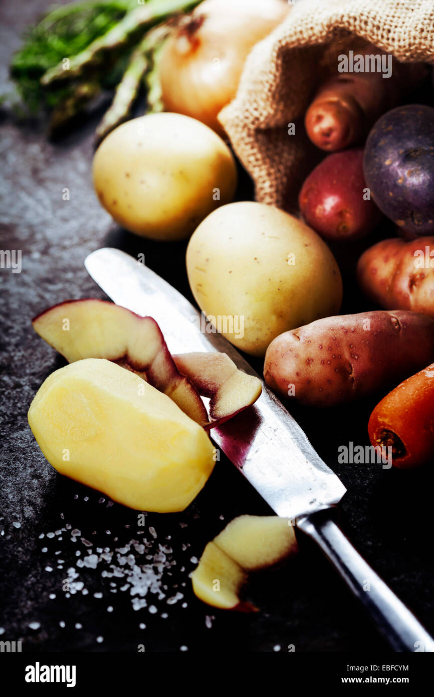 Fresh vegetables (potato, onion, carrot) ready for cooking. Health ...