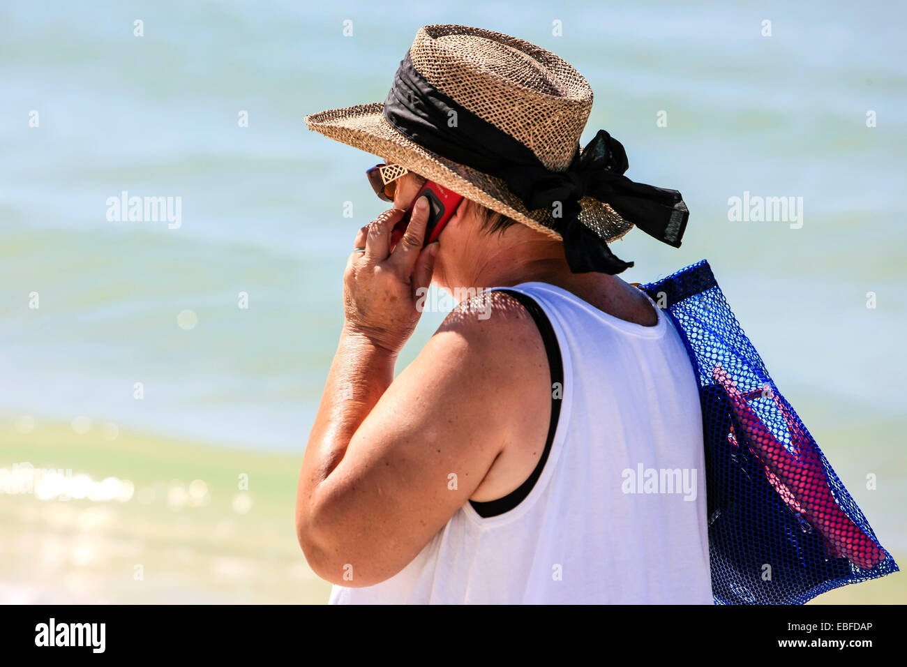 Conversation on beach hi-res stock photography and images - Alamy