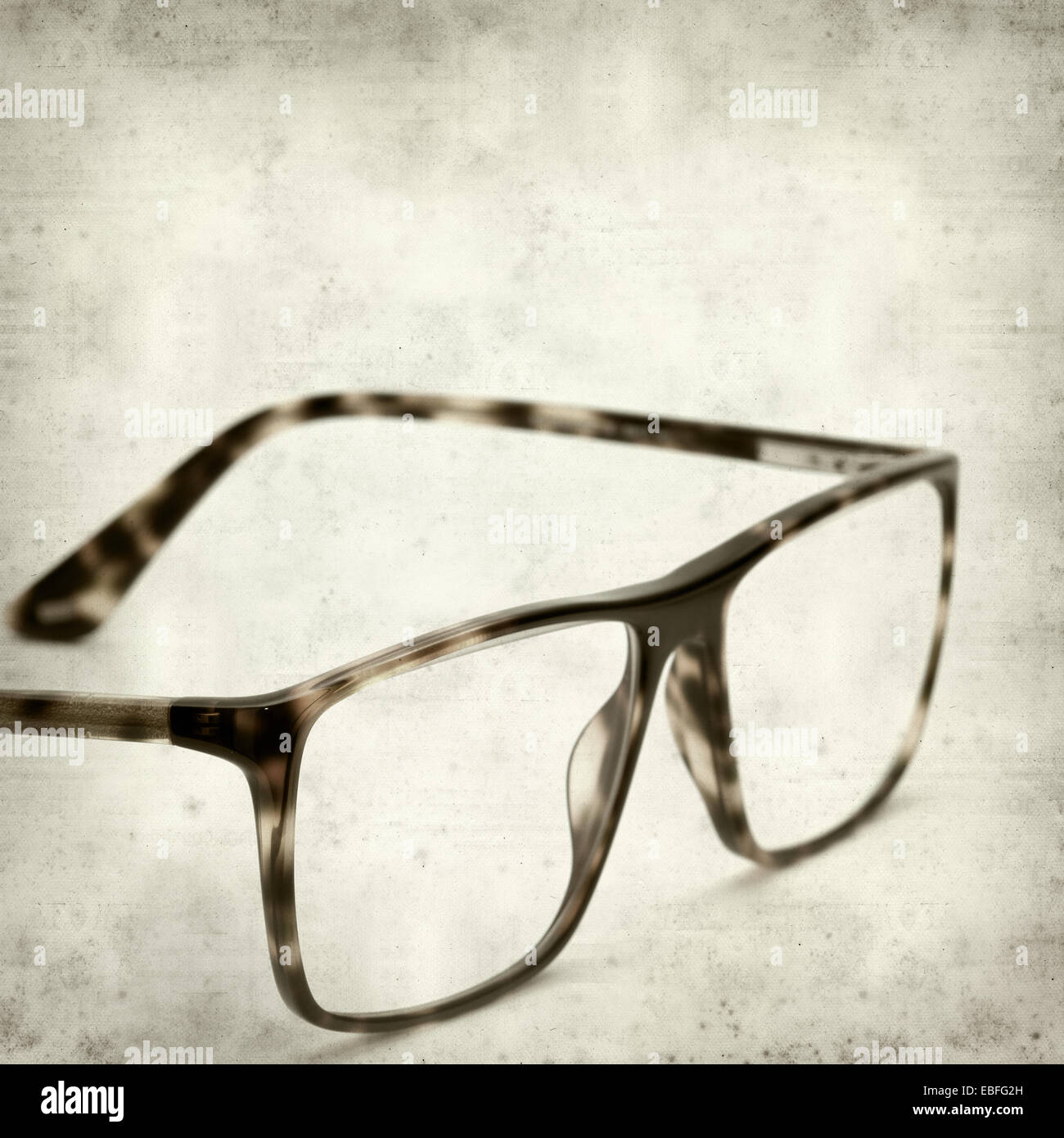 textured old paper background with reading glasses Stock Photo - Alamy