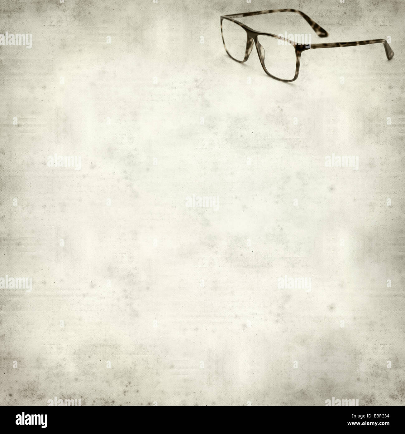 textured old paper background with reading glasses Stock Photo - Alamy