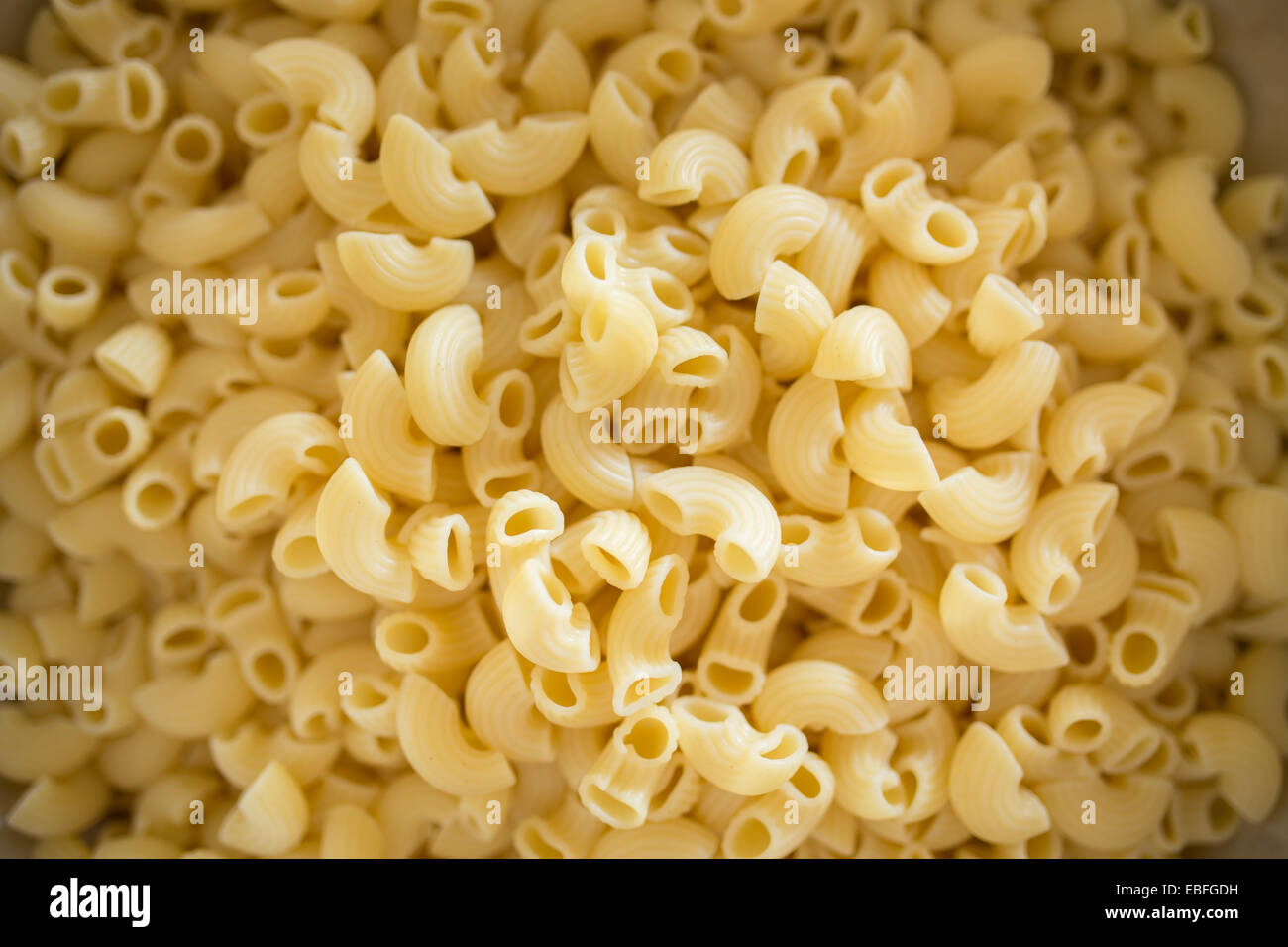 Raw macaroni pasta hi-res stock photography and images - Alamy