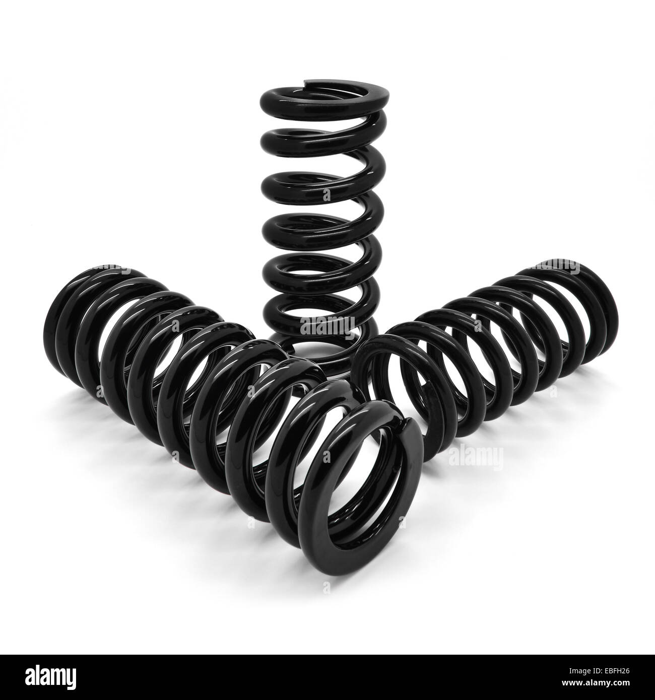 Coil springs on a white background Stock Photo - Alamy