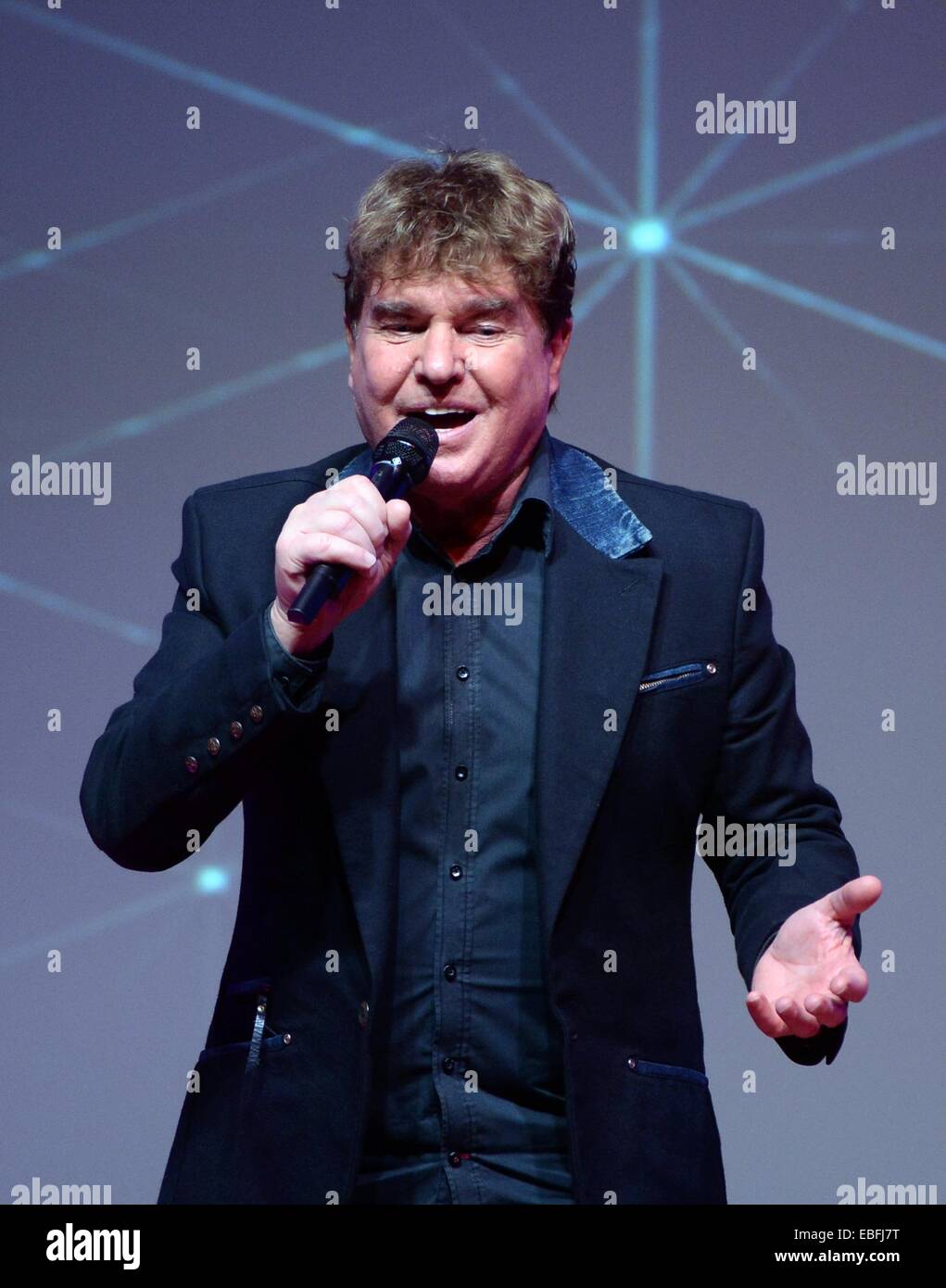 Riesa, Germany. 30th Nov, 2014. Singer Frank Schoebel performs during ...
