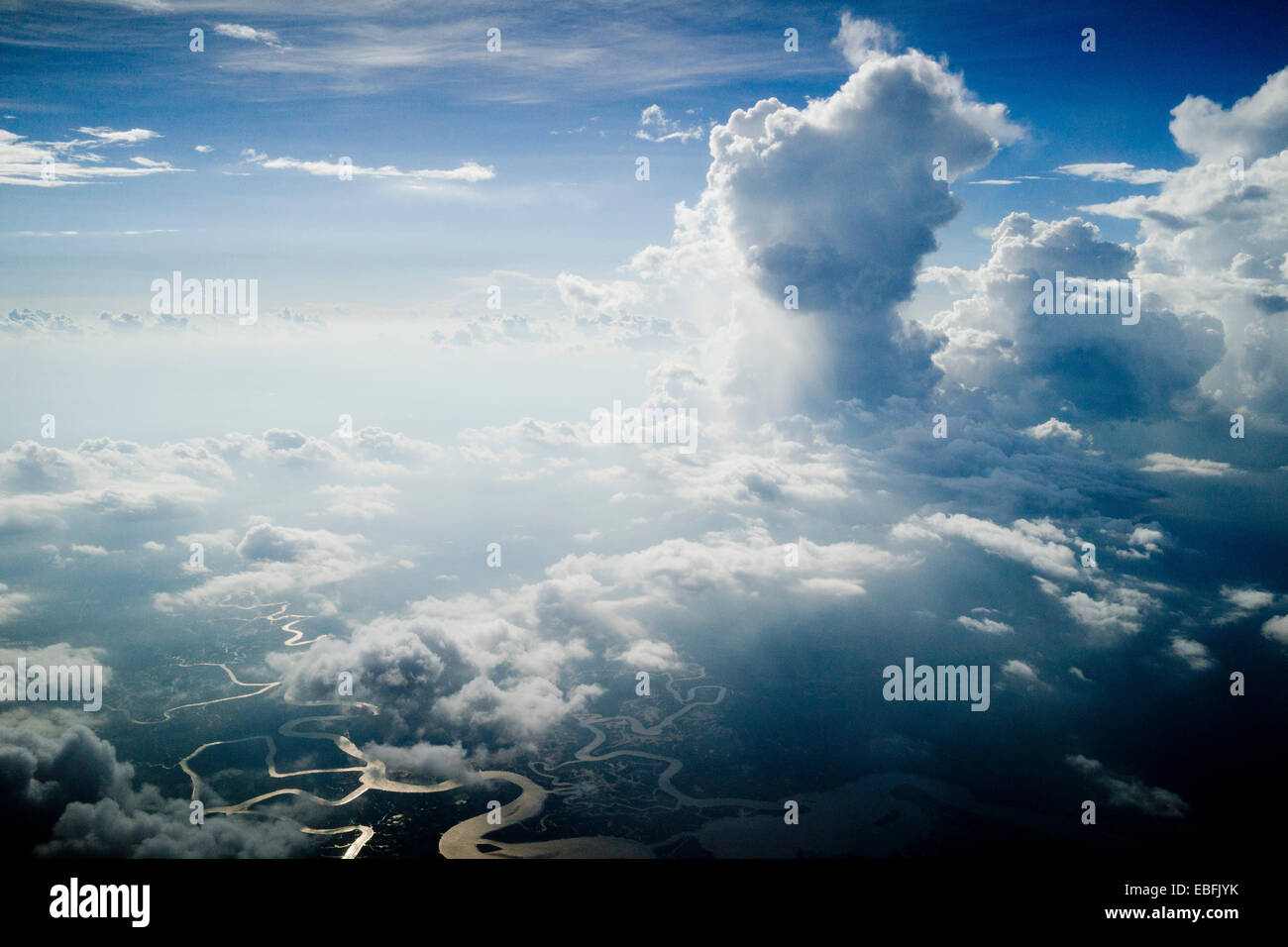 High altitude clouds, cumulus clouds, in color, dramatic photograph ...
