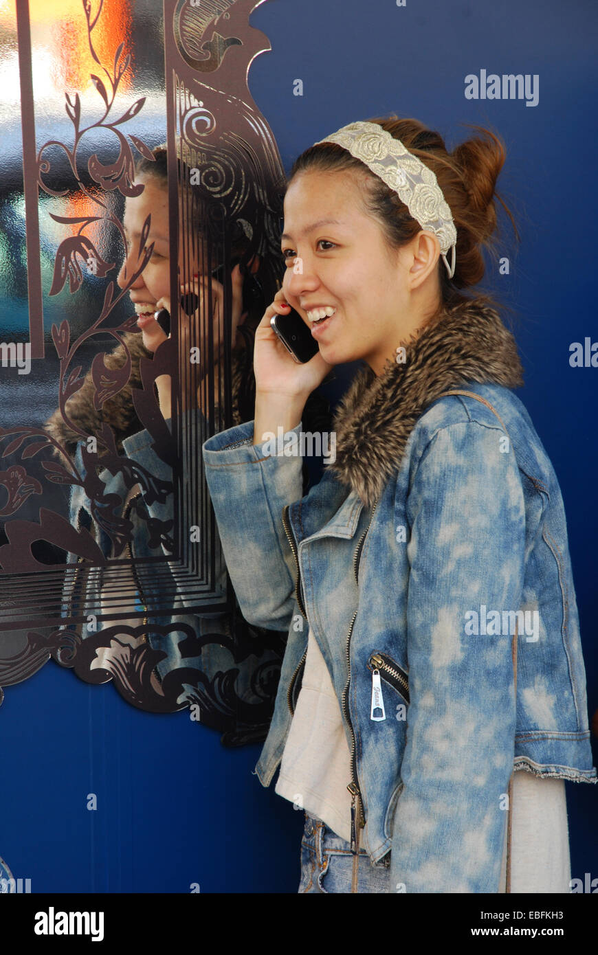 Girl making telephone call Stock Photo - Alamy