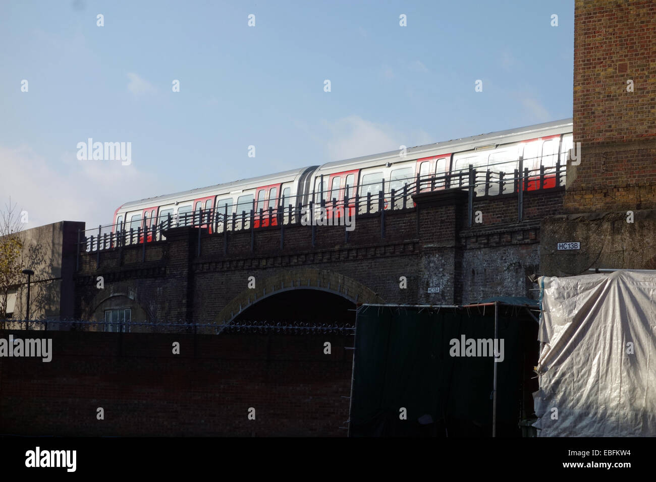London's Tube train approaching Latimer Road tube station with trains ...