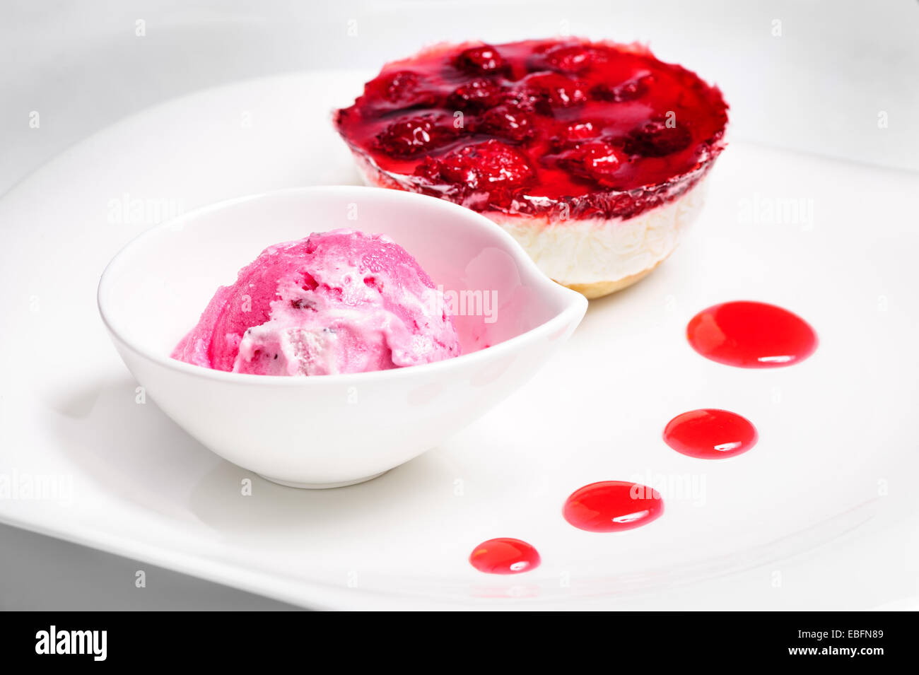 Raspberry cheese cake and ice cream ball Stock Photo - Alamy