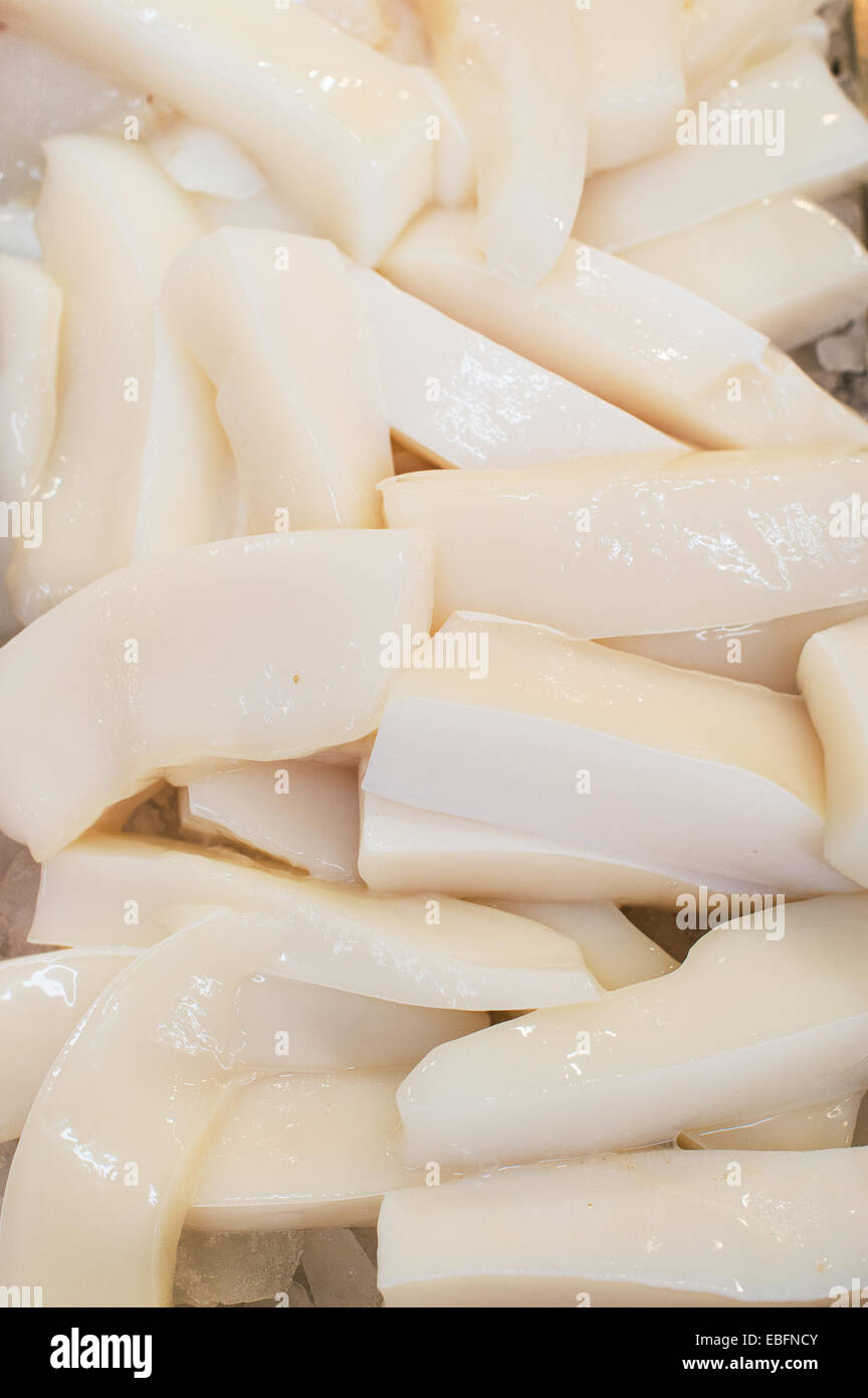 Fillet of fresh squid on the market Stock Photo - Alamy