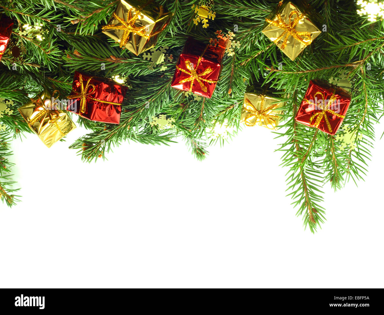 Christmas Border of fir tree branches with golden and red gifts and ...