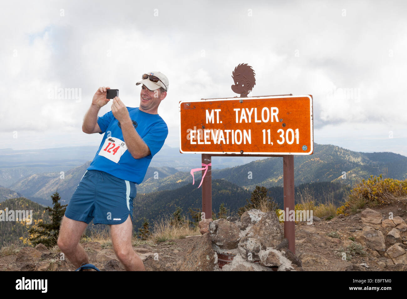 Runner takes a self-portrait at the summit during the Mt Taylor 50k ...