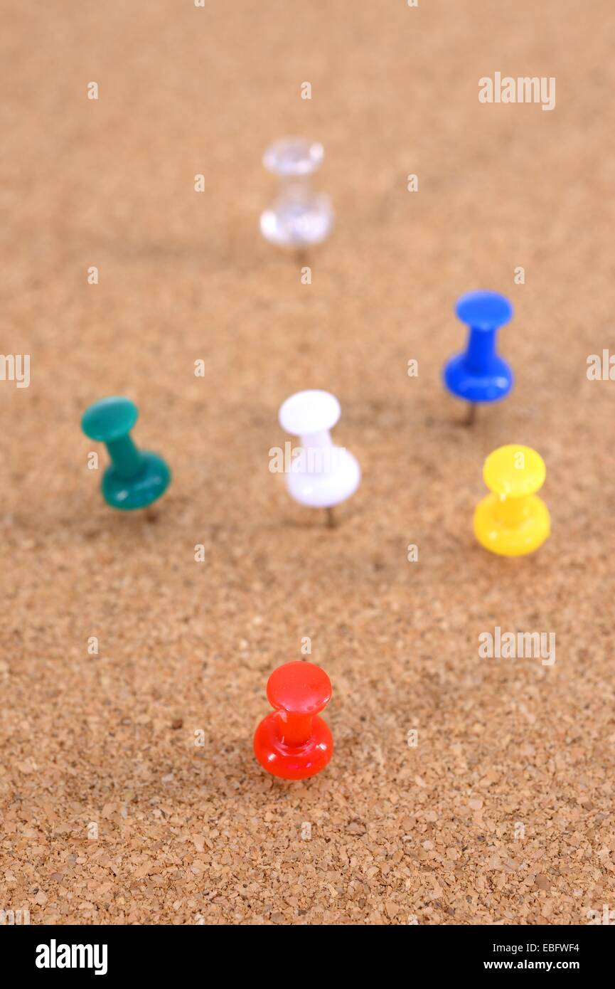 A close up shot of a notice board pins Stock Photo - Alamy