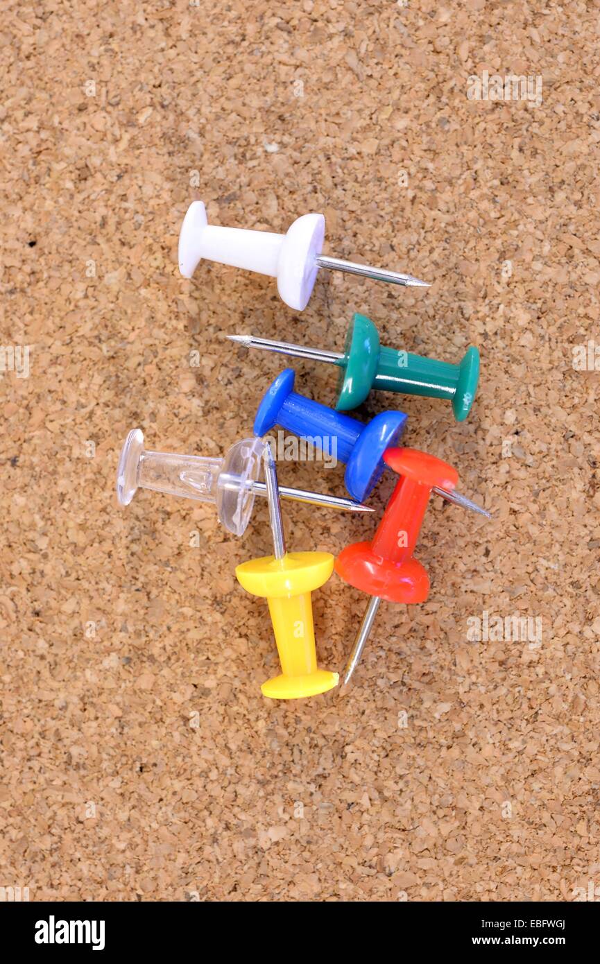 A close up shot of a notice board pins Stock Photo - Alamy