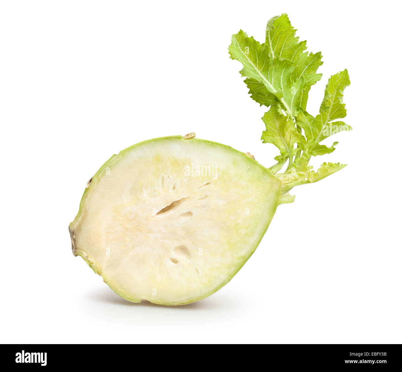 one kohlrabi cut into slices and white background Stock Photo - Alamy
