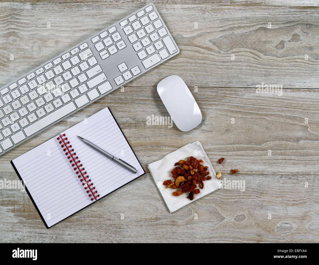 Top view of business office consisting of computer keyboard, notepad ...
