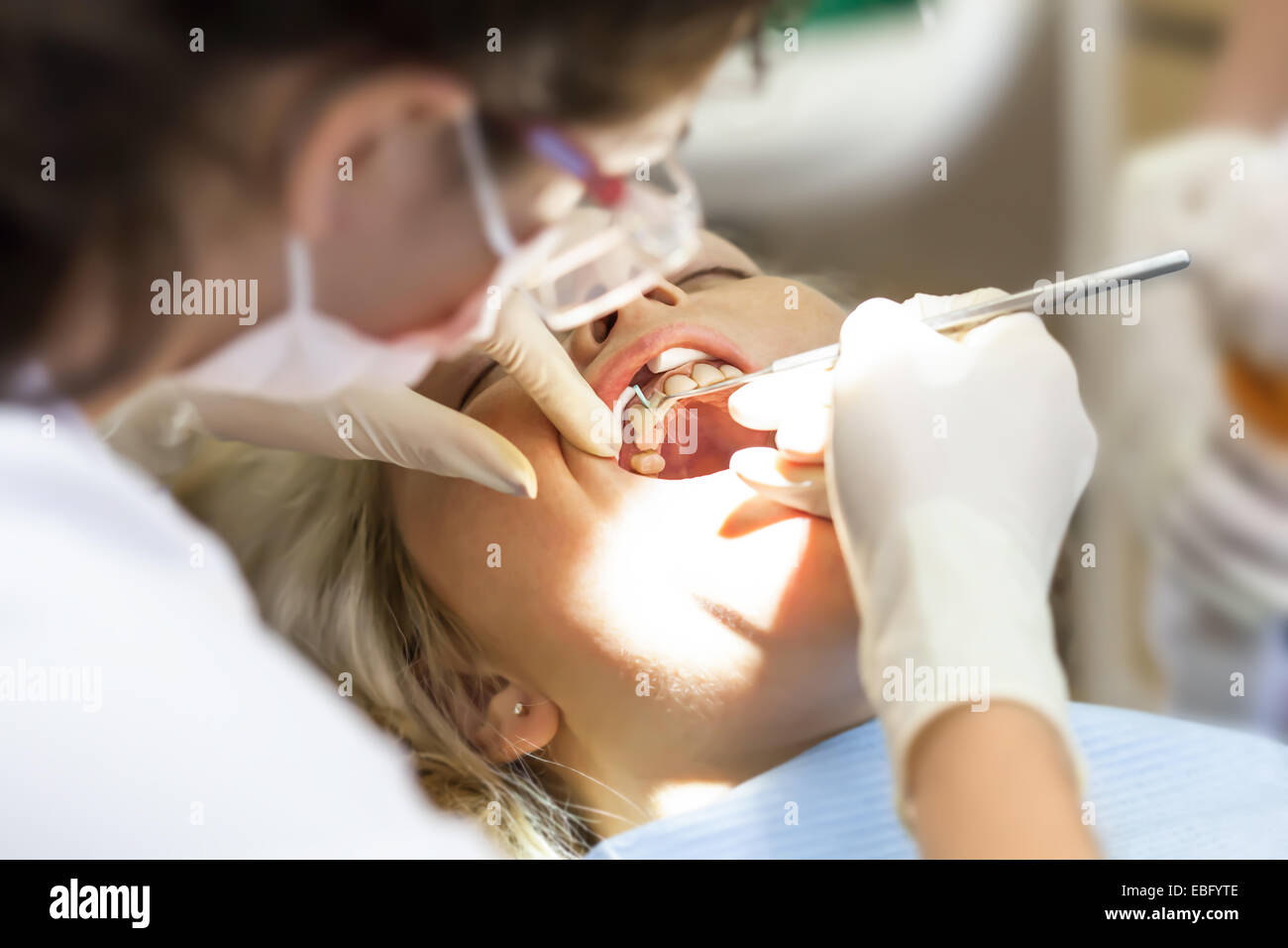 Dentist treat female patient hi-res stock photography and images - Alamy