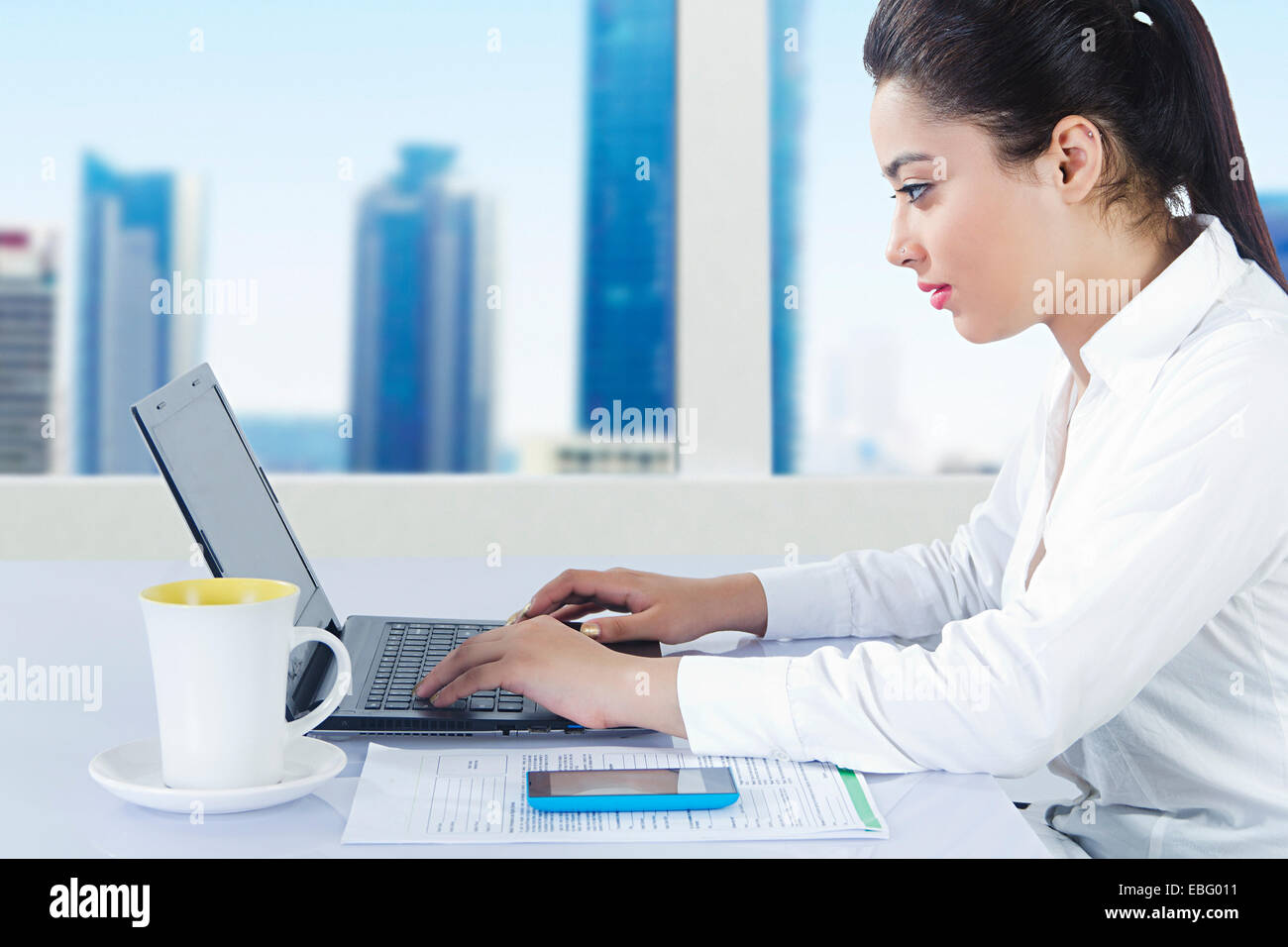 indian Business woman office working laptop Stock Photo - Alamy