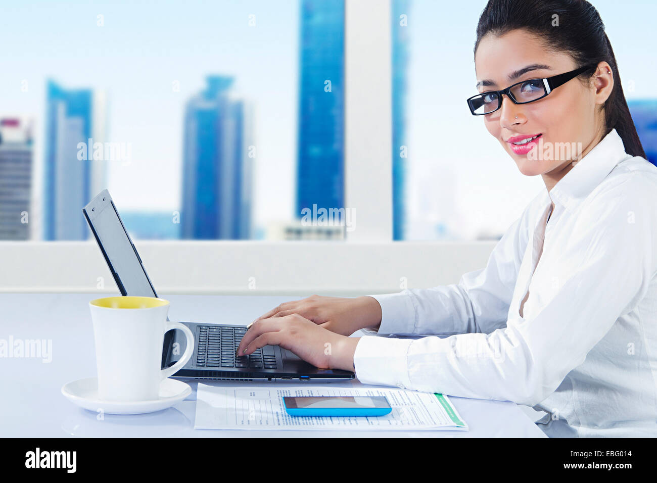 indian Business woman office working laptop Stock Photo - Alamy
