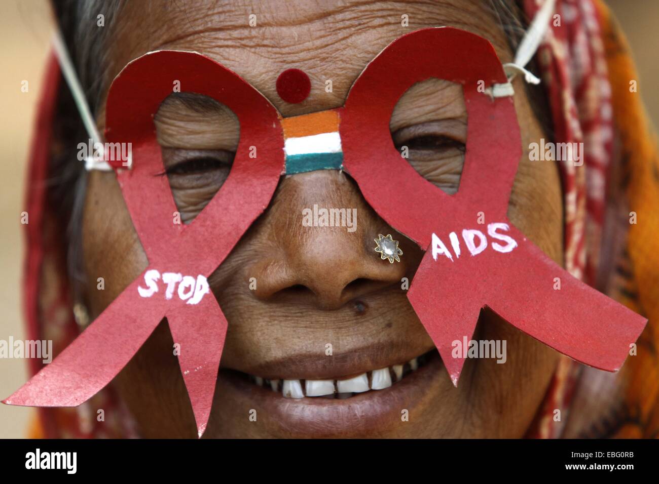 Bhubaneswar. 30th Nov, 2014. An activist wearing the logo of ANTI-AIDS ...