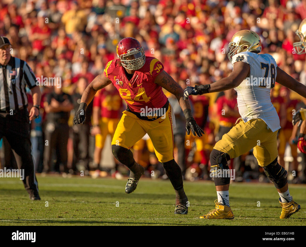 Los Angeles, CA, USA. 29th Nov, 2014. USC defensive end (94) Leonard Williams chases the ball ...