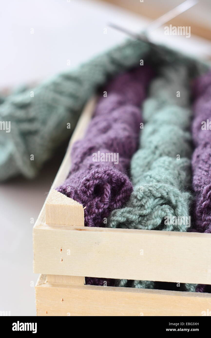 wool with needles in cage Stock Photo - Alamy