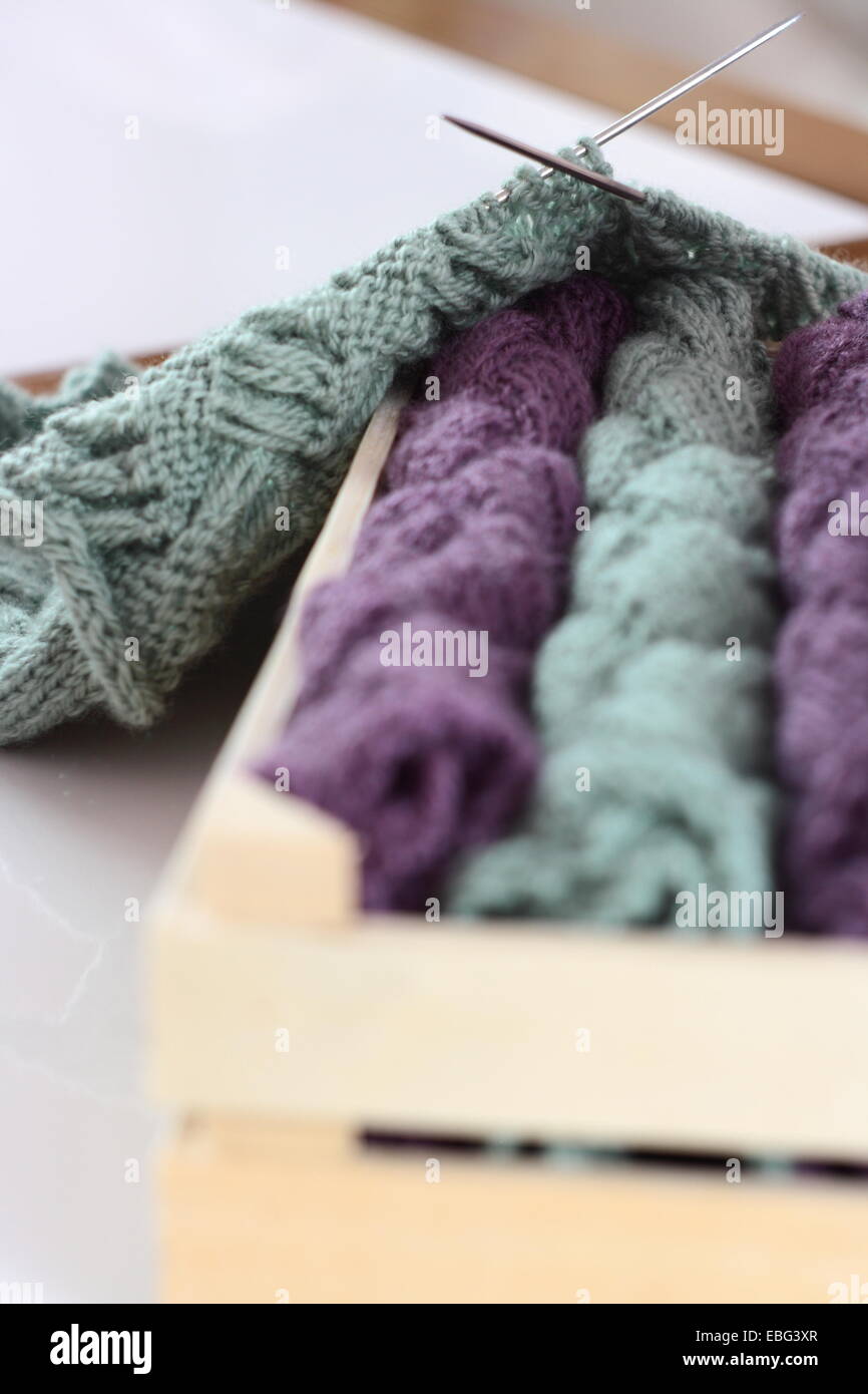 wool with needles in cage Stock Photo - Alamy