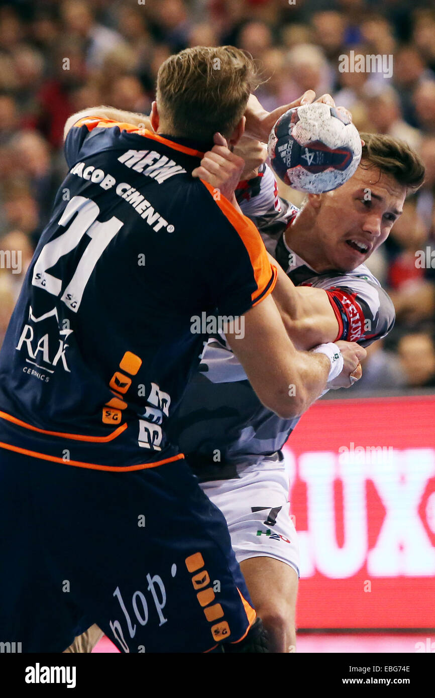 Flensburg, Germany. 30th Nov, 2014. Flensburg's Jacob Heinl (L) and ...