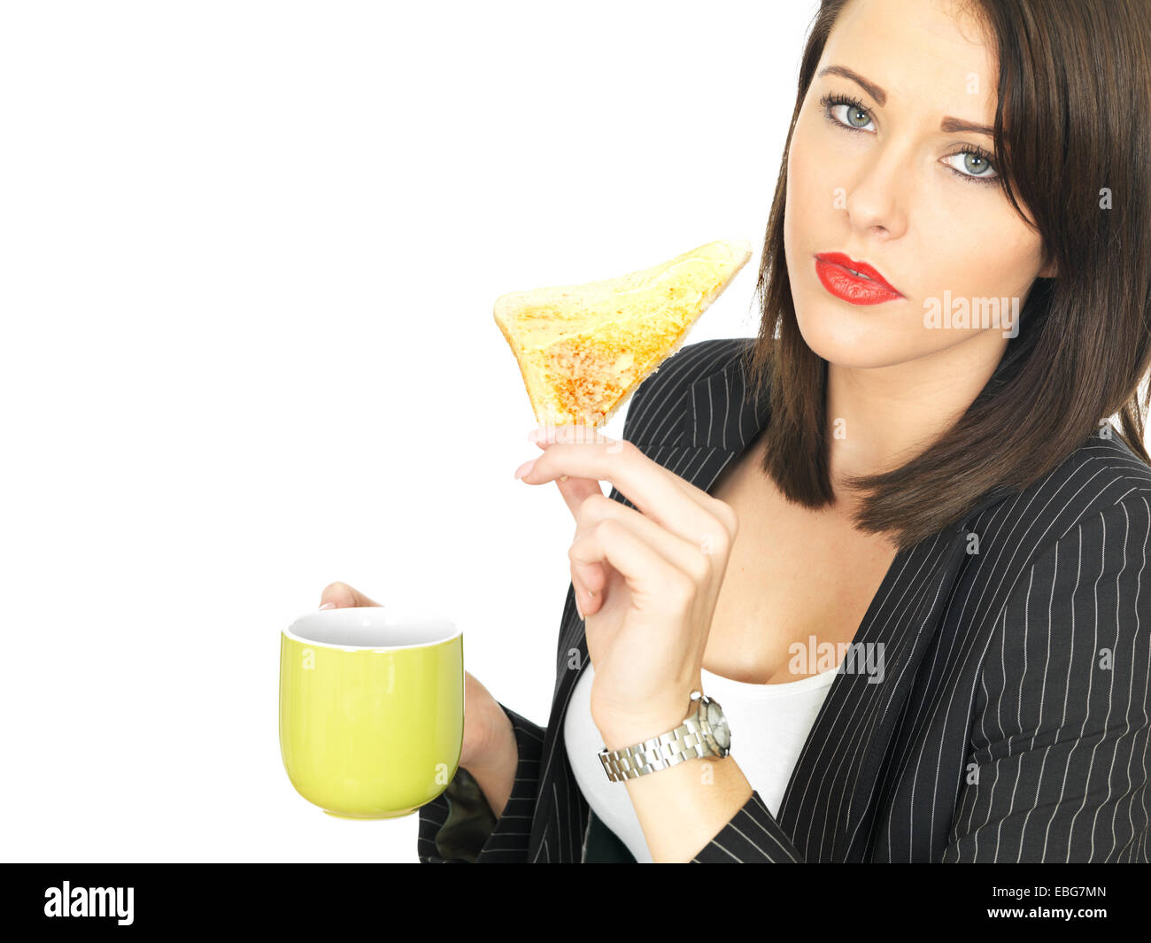Young woman eating toast model hi-res stock photography and images - Alamy