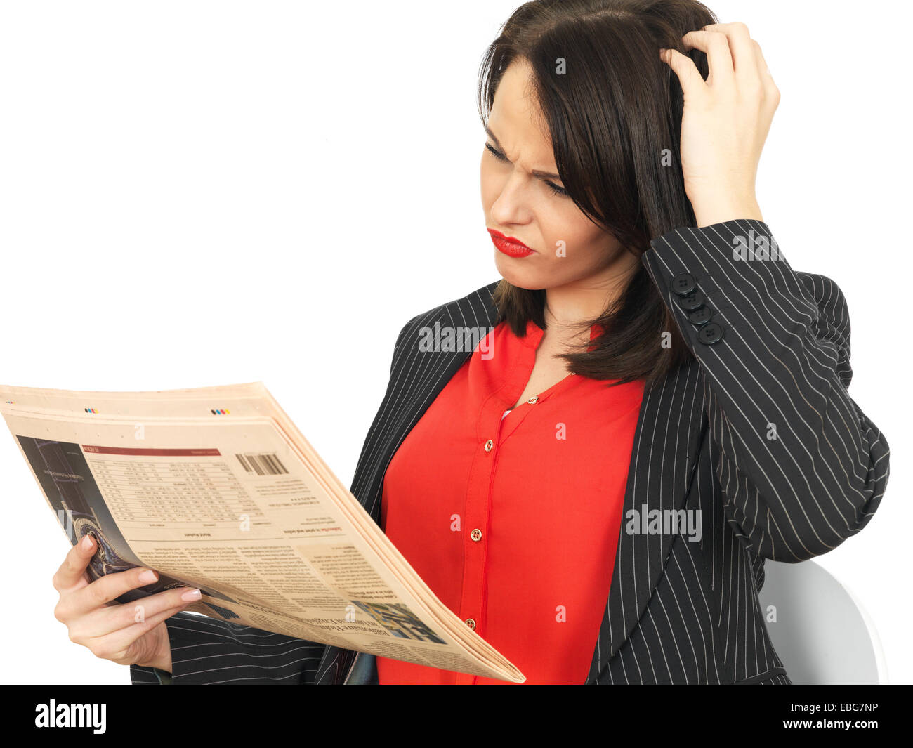 Attractive Business Woman Reading a Newspaper Stock Photo - Alamy
