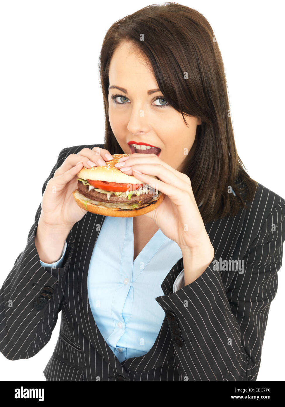 Attractive Business Woman Eating a Beef Burger Stock Photo - Alamy