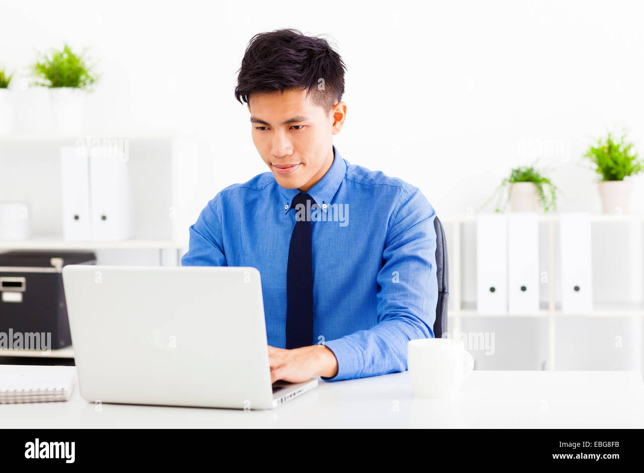 Office computer young man hi-res stock photography and images - Alamy