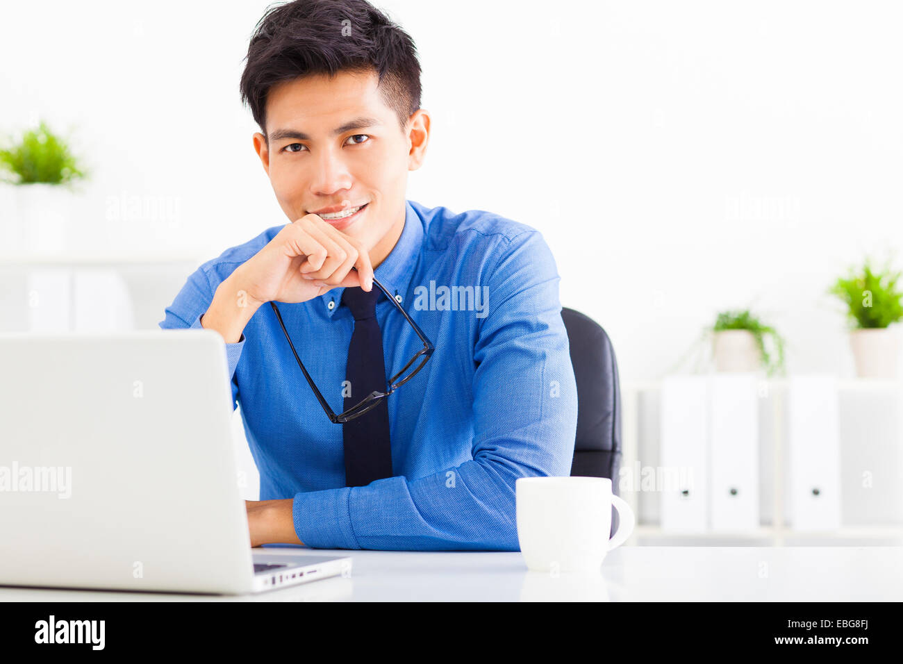 Office computer young man hi-res stock photography and images - Alamy