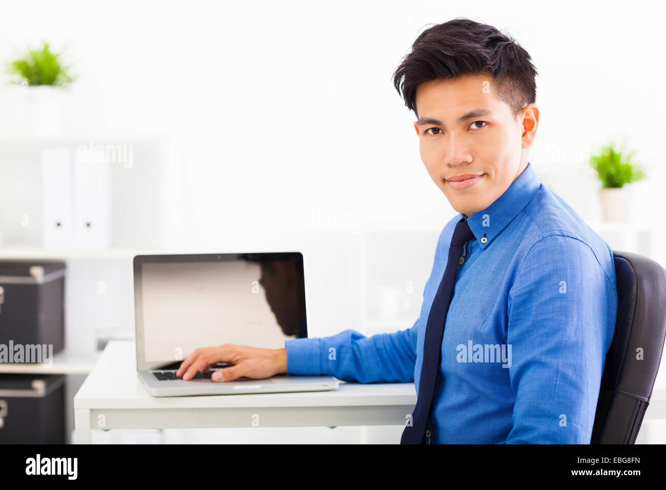 Young asian business man working in the office Stock Photo - Alamy
