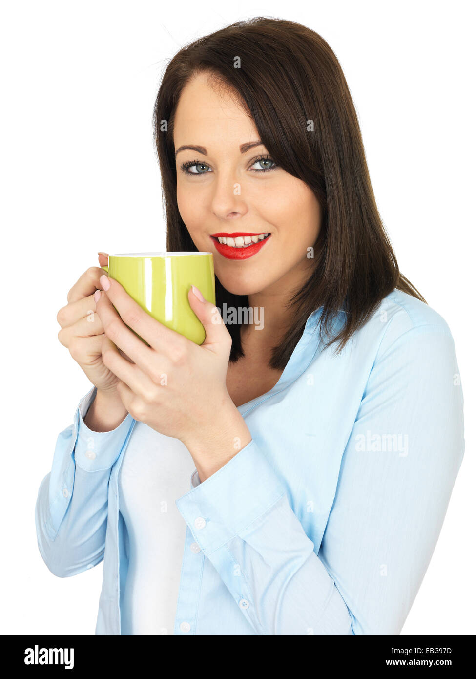 Attractive young woman drinking coffee Stock Photo - Alamy
