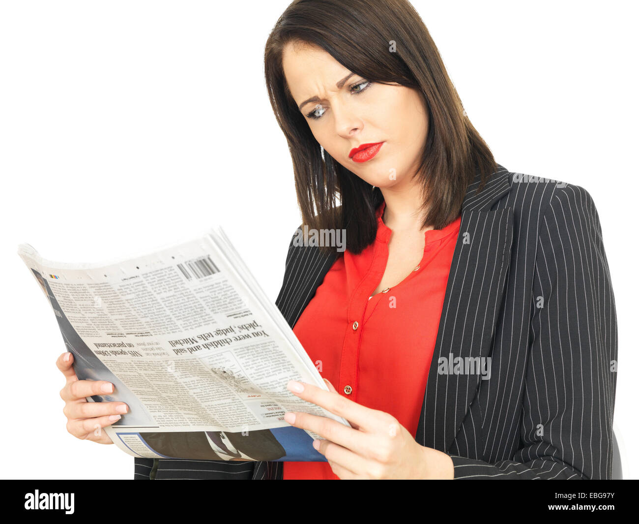 Attractive Business Woman Reading a Newspaper Stock Photo - Alamy
