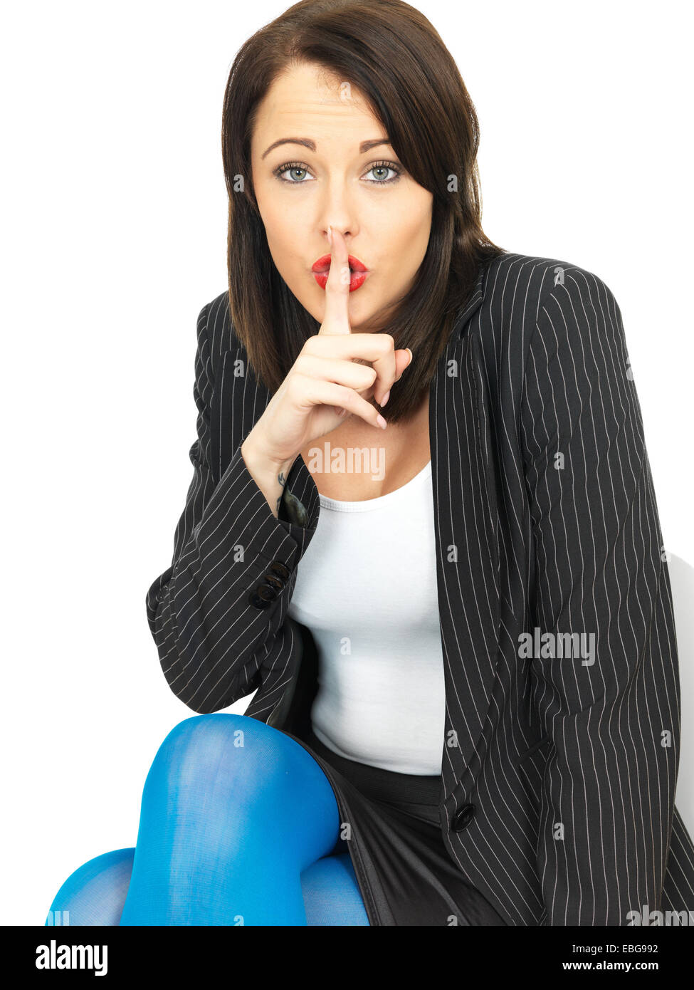 Attractive Young Business Woman Keeping a Secret Stock Photo - Alamy