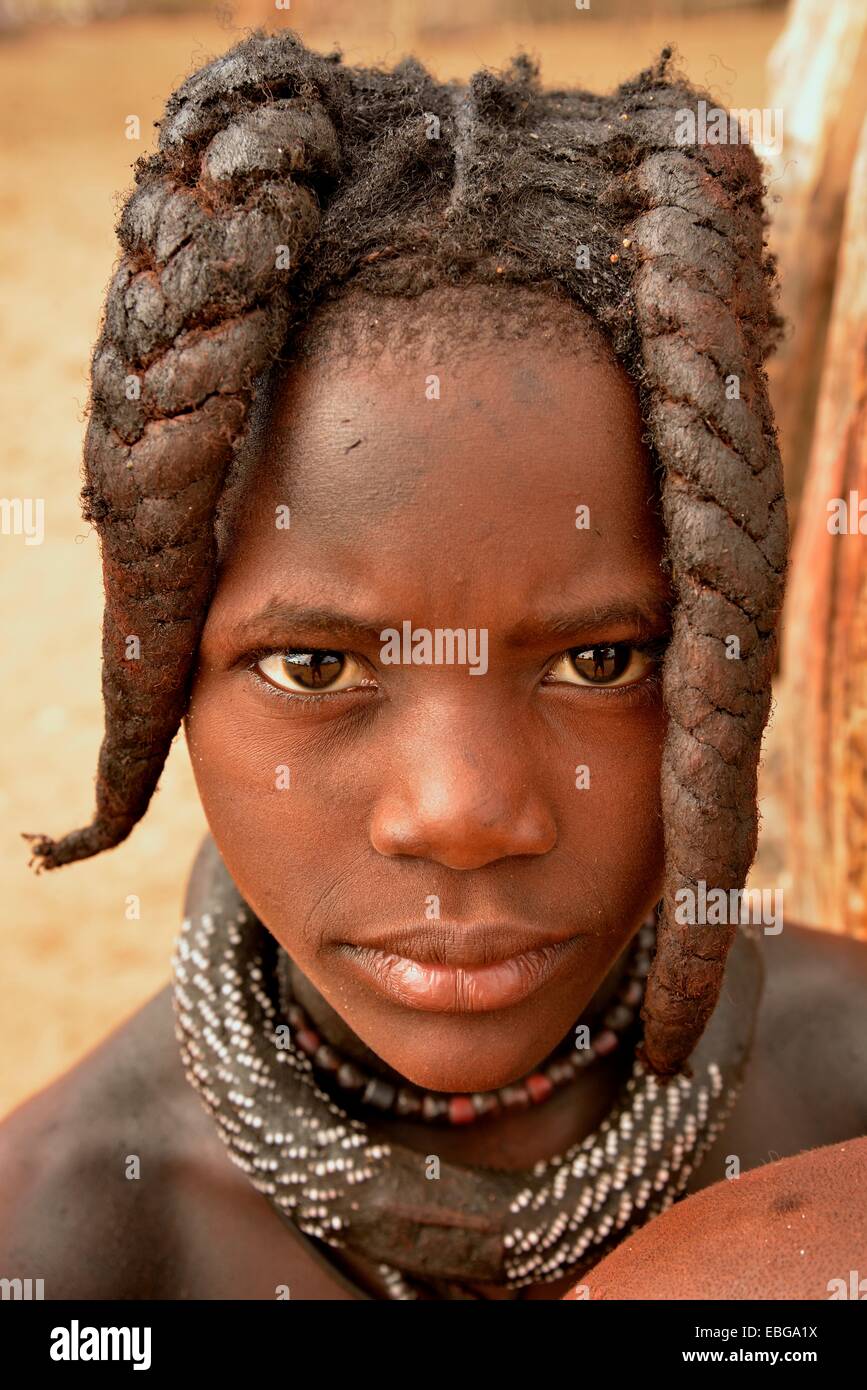 Himba girl with typical hairstyle, Omuramba, Kaokoland, Kunene, Namibia ...