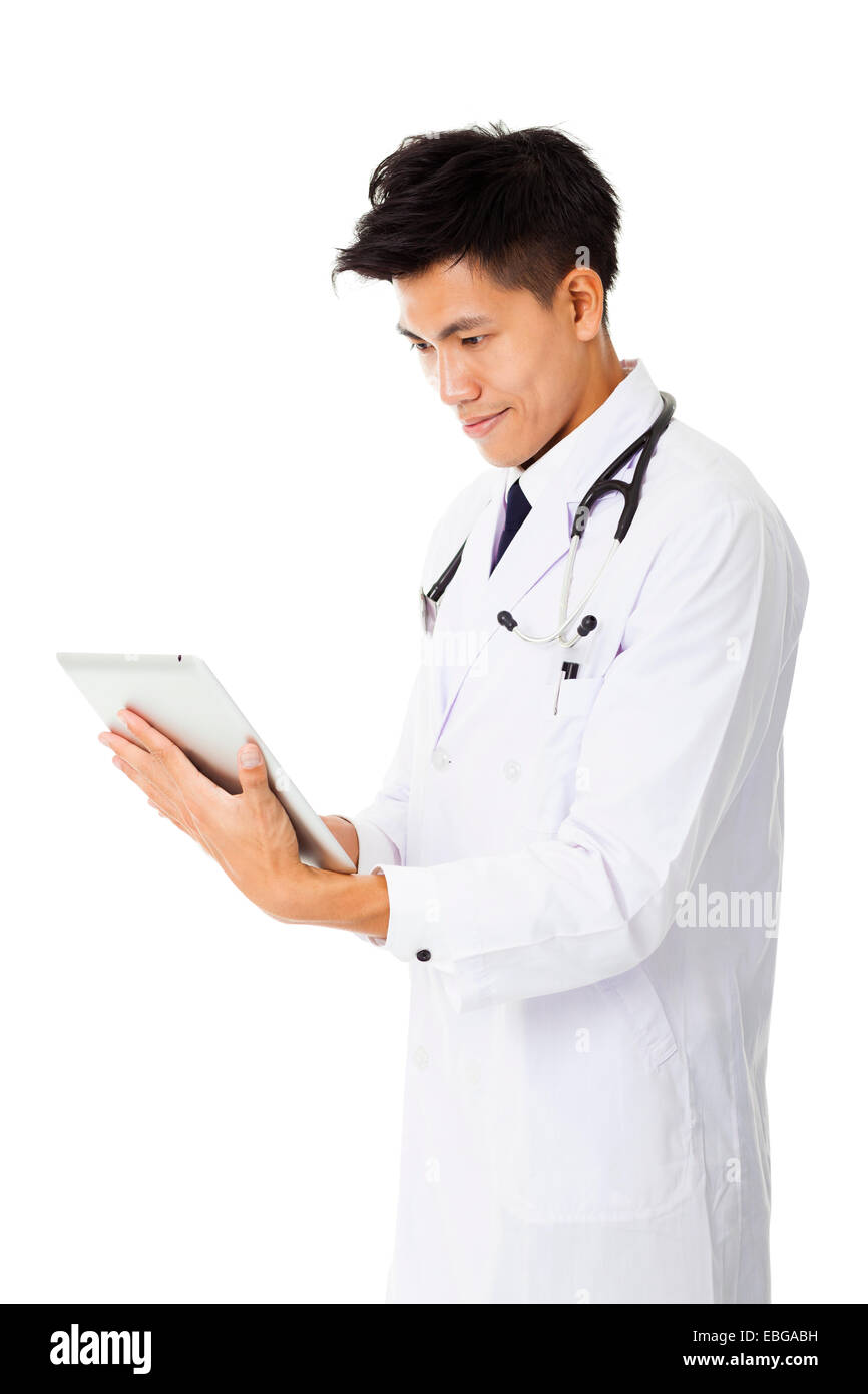 asian young doctor watching tablet pc Stock Photo - Alamy